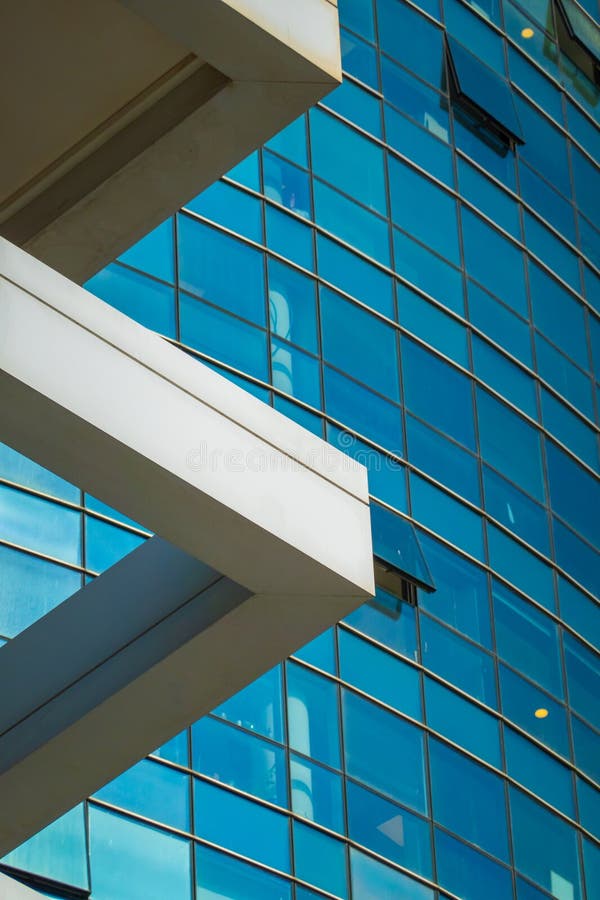 Abstract Close-up of a Modern Glass Building with Reflective Windows ...