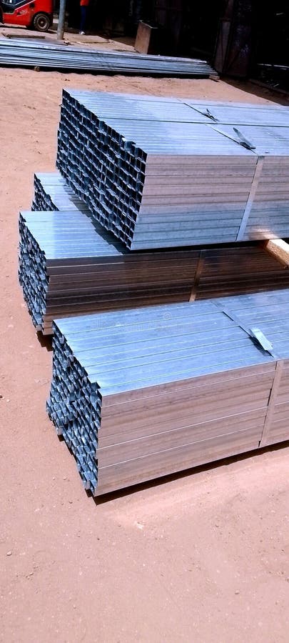 Abstract Close Up of a Stack of Steel Pipes at the Construction Site ...