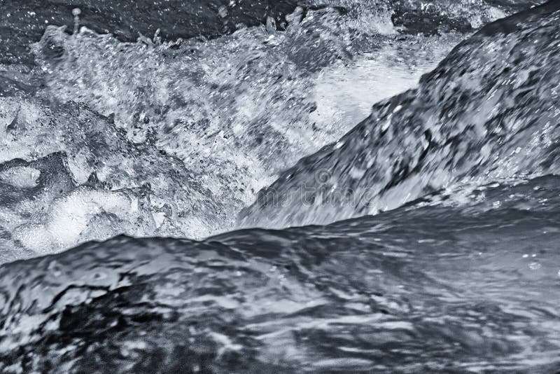 Abstract Close-up of the Water and Waves of a River in Black and White ...
