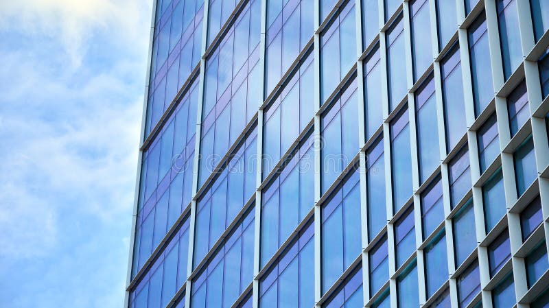 Glass Clad Facade of a Modern Building Covered in Reflective Plate ...