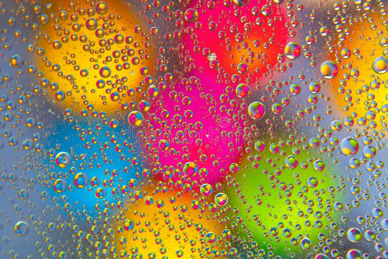 Abstract Colored Balls of Oily Liquid on a Blurred Background. Abstract ...