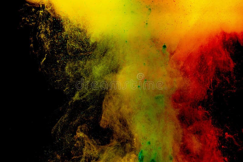 Abstract Colored Dust Explosion on a Black Background.abstract Powder ...