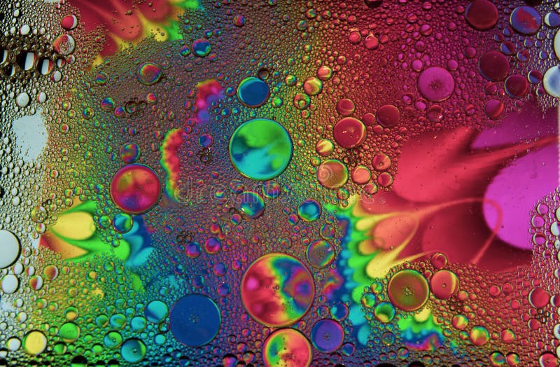 Abstract Colorful Bubbles. Freeze Motion of Color Dust Particles Splash ...
