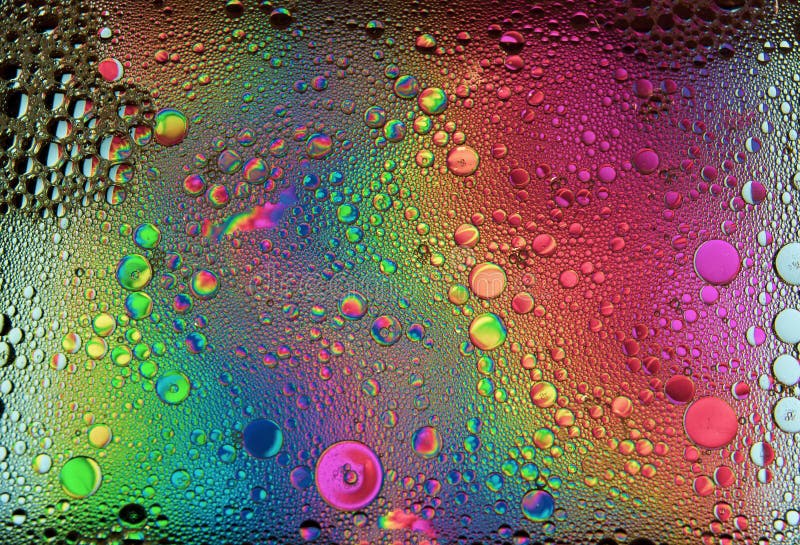 Abstract Colorful Bubbles. Freeze Motion of Color Dust Particles Splash ...