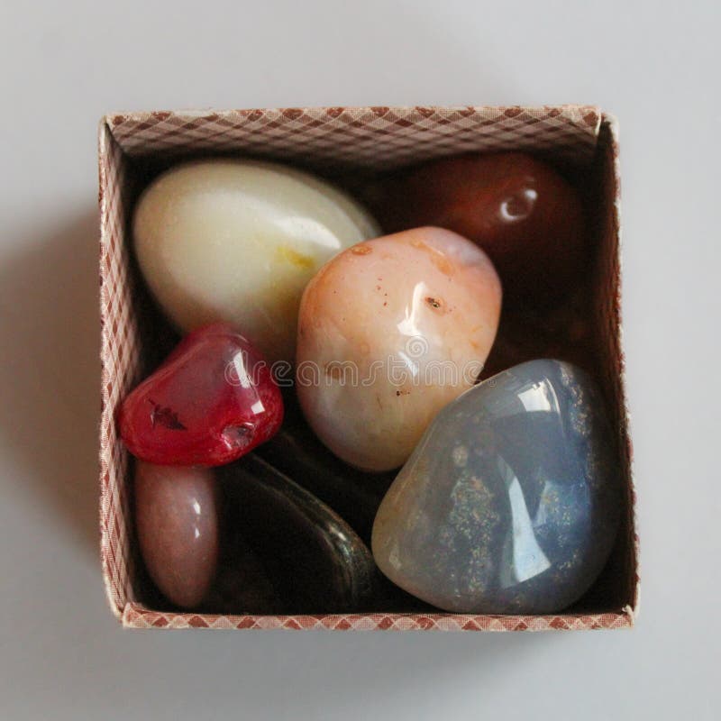 Small Box of Abstract Colorful Pebbles Shiny Smooth Rocks Isolated on a ...