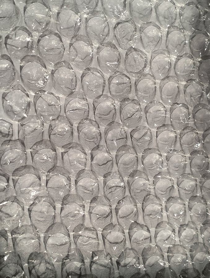 Close-up Shot of a Sheet of Bubble Wrap Stock Image - Image of floor, letter: 335868899