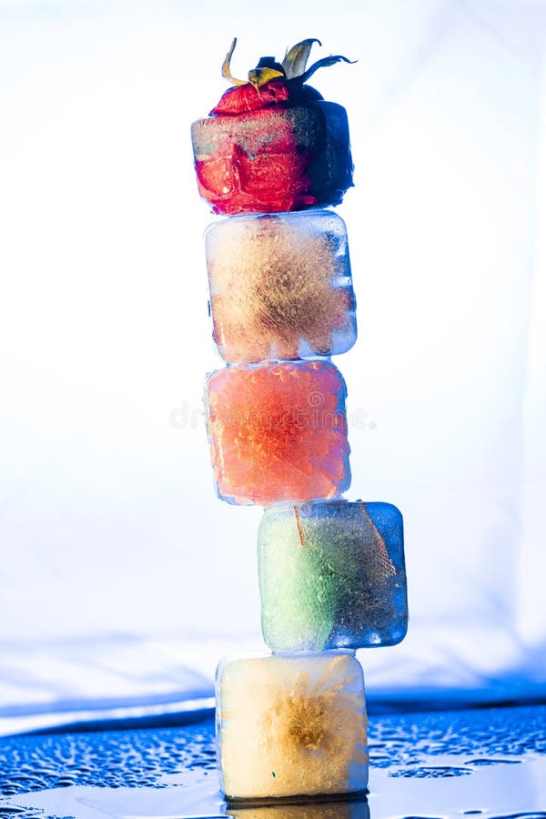 Abstract Composition with Stack of Colourful Ice Blocks on White ...