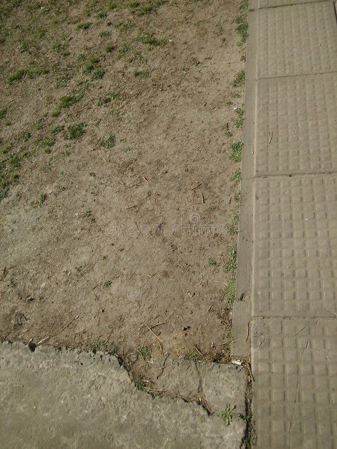 Abstract Concrete Sidewalk Wallpaper with Different Elements in ...