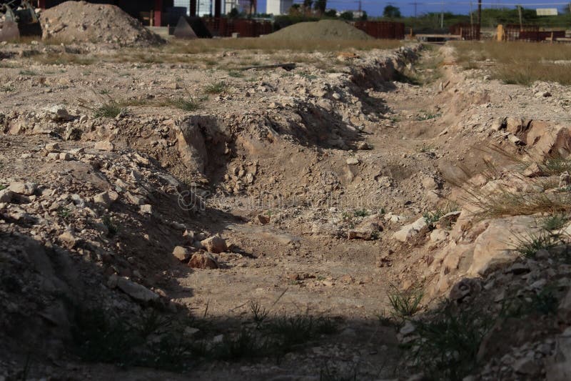Abstract Construction Background. Dirt and Rock Prior To Footings ...