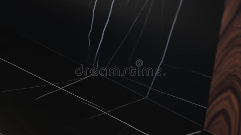 This is an Abstract Dark Surface Featuring a Subtle Light Reflection ...