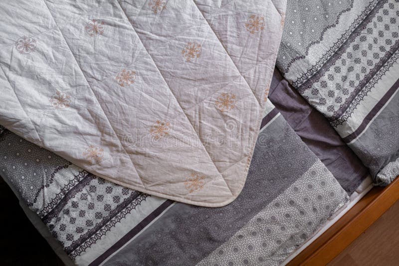 The Abstract Design of a Blanket in the Bed Textile Decor Stock Image ...