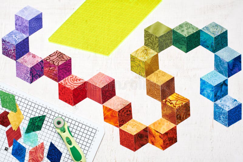 Abstract Design of Colorful Pieces Fabrics that Look Like Cubes, Quilting Tools Stock Image ...
