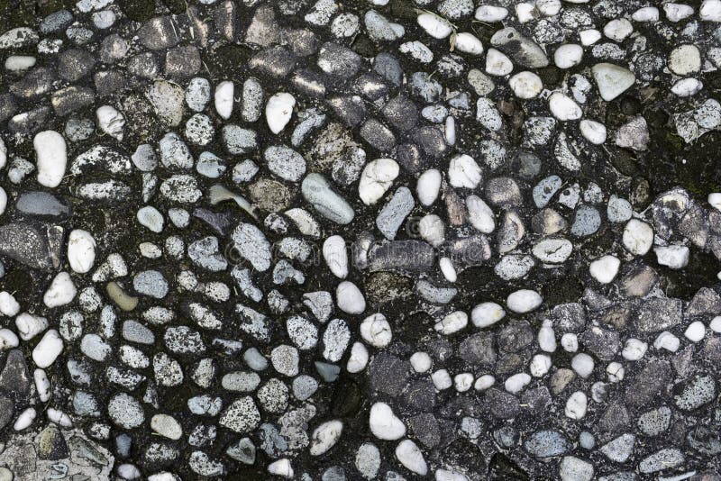 Design Pattern of Multi Color Stones in Concrete Pavement Background ...