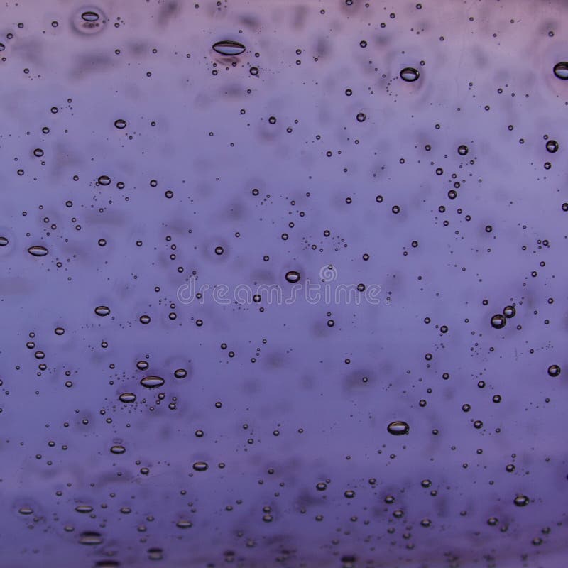 Abstract Drops on Purple Glass Background Stock Photo - Image of ...
