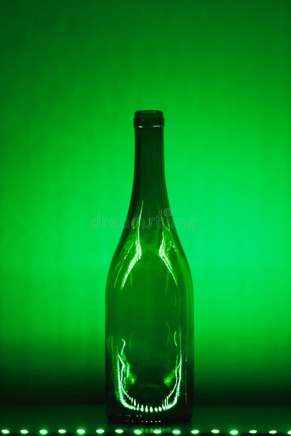 Abstract Empty Wine Bottle with Green Illumination Stock Photo - Image ...
