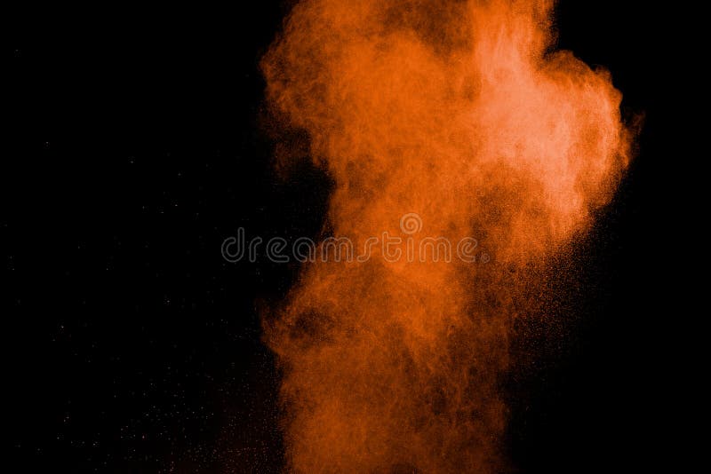 Abstract Explosion of Orange Dust on Black Background. Freeze Motion of ...
