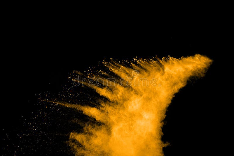 Abstract Explosion of Orange Dust on Black Background. Freeze Motion of ...