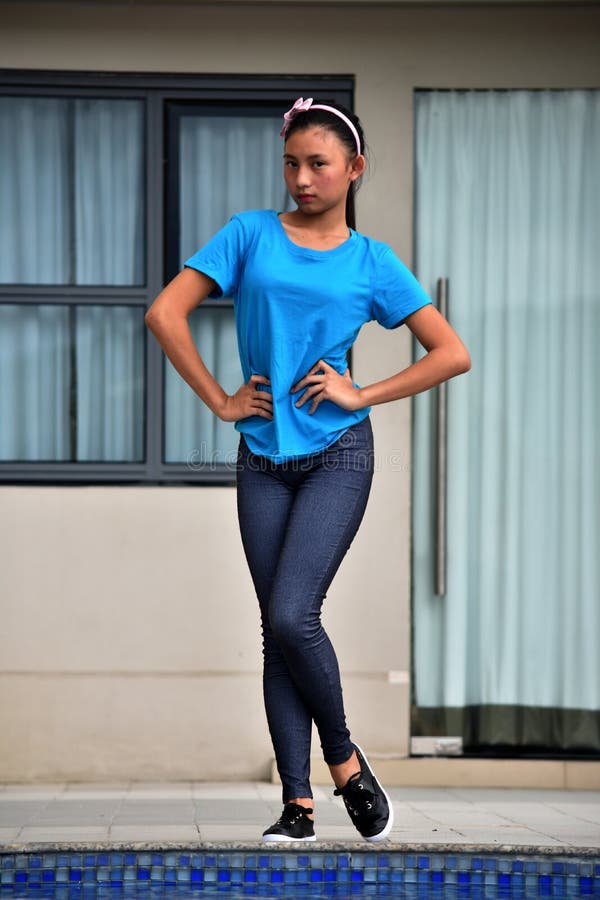 A Posing Teenage Female Standing Stock Image - Image of model, poses ...