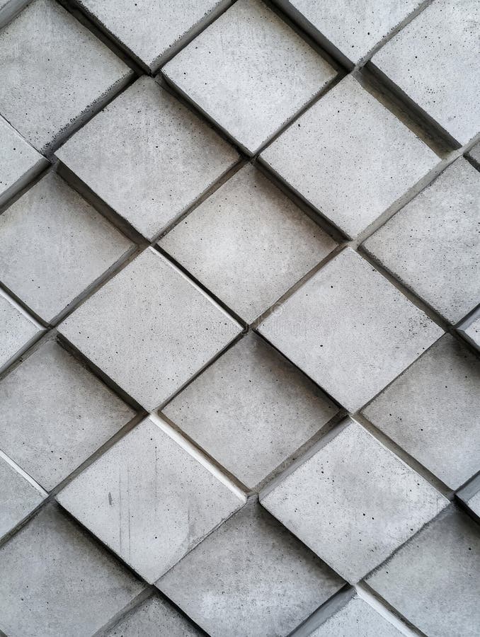 Abstract Geometric Pattern of Diamonds on Grey Concrete Wall ...