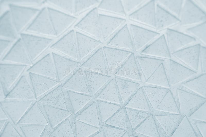 Abstract Geometric Pattern of Light Blue or Grey Triangles with Glass ...