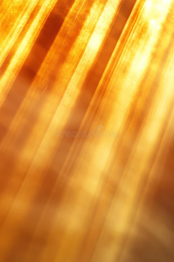 Abstract Golden Light Rays Creating a Warm and Radiant Background with ...