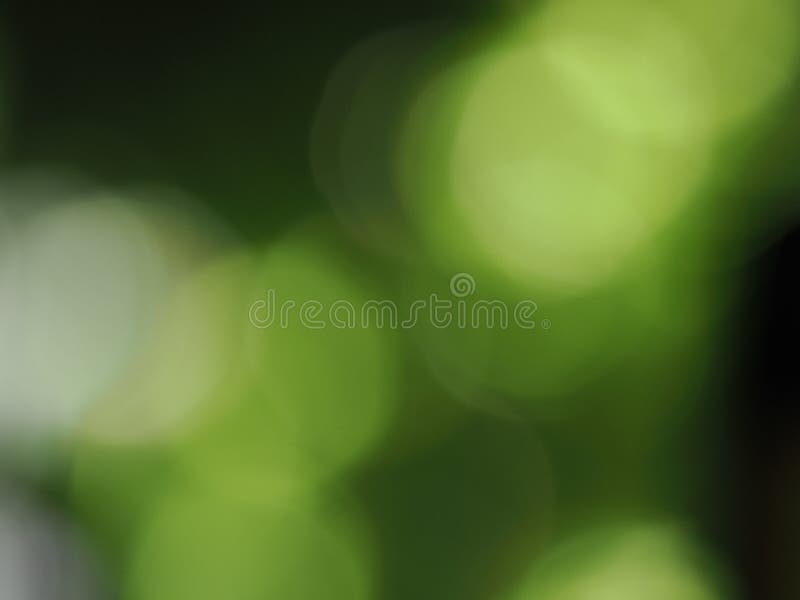 Abstract Pattern of Overlapping Blurred Light Green Circles on a Darker ...