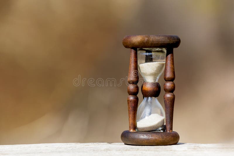 Abstract Hourglass on Oak Leafs Stock Photo - Image of outdoor, clock ...