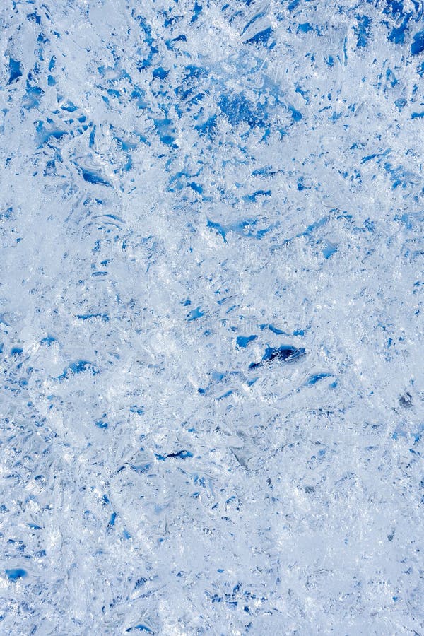Abstract Ice Background. Blue Background with Cracks on the Ice Surface ...