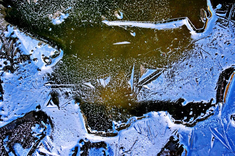 Abstract Ice Pattern and Drawing Appearing on the Surface of the Water ...