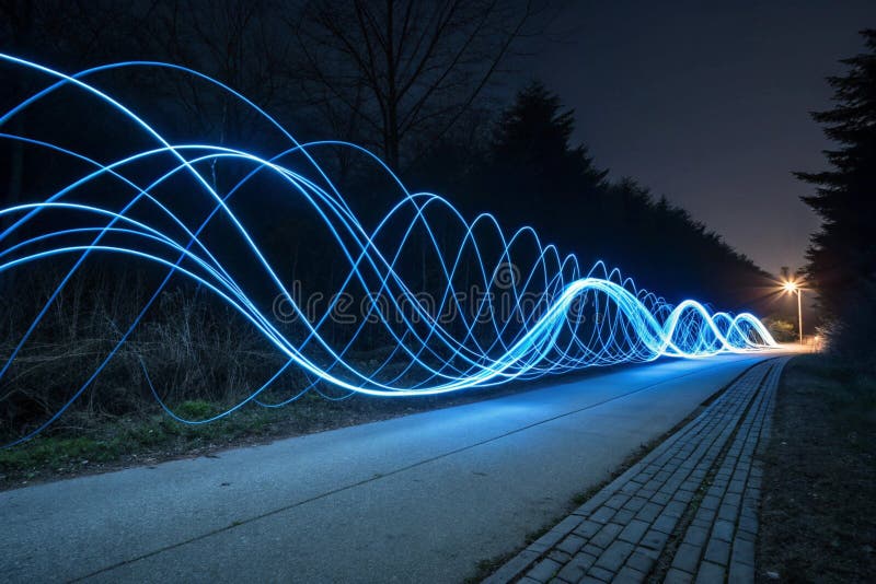 Abstract Blue Light Trails on Dark Background Stock Illustration ...