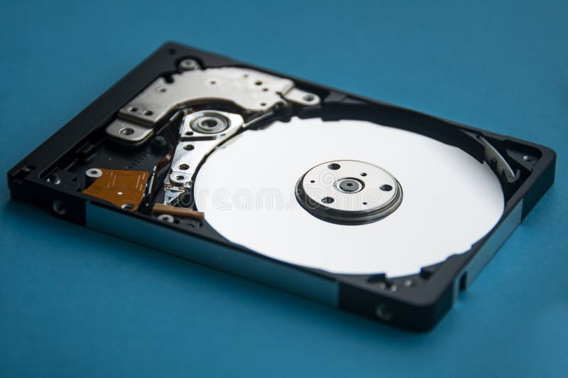 The Abstract Image of Inside of Hard Disk Drive on Blue Cover ...