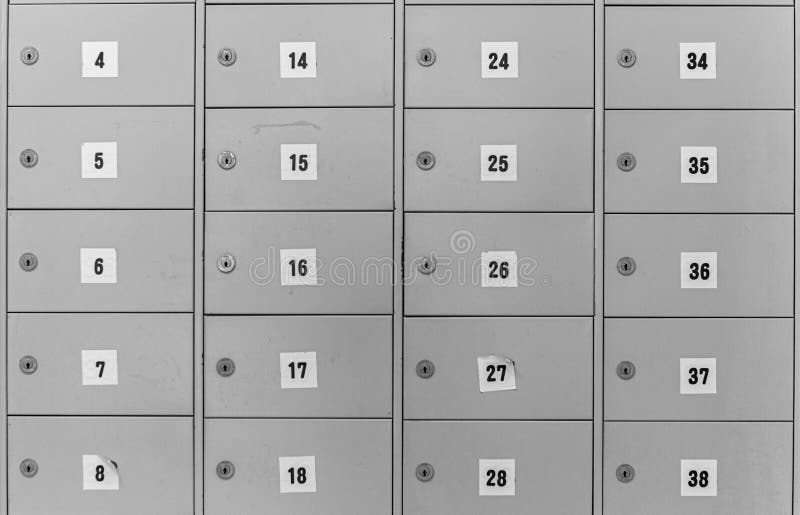 Abstract Image of Numbered Locked Metal Boxes, Arranged in Grid Pattern ...