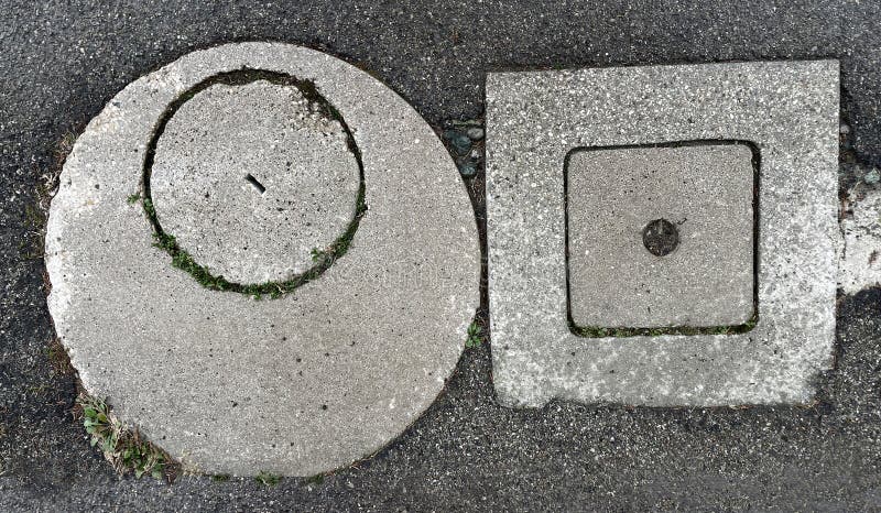 Abstract Image of Two Concrete Wall Hatches Located on the Ground ...