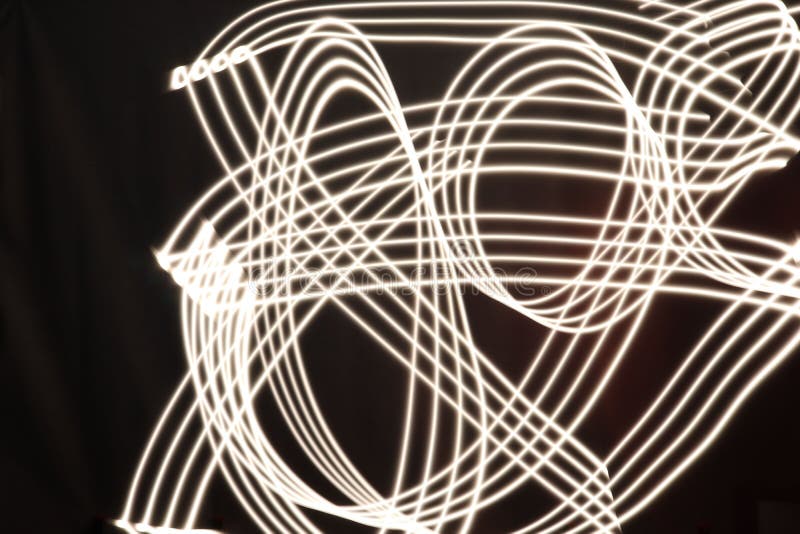 Abstract Light Painting with LED Light Source on a Dark Background ...