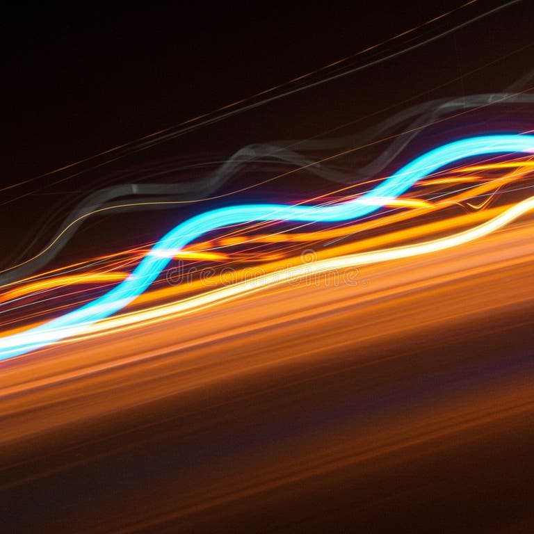 Abstract Light Trails Create Dynamic, Flowing Patterns Against a Dark ...