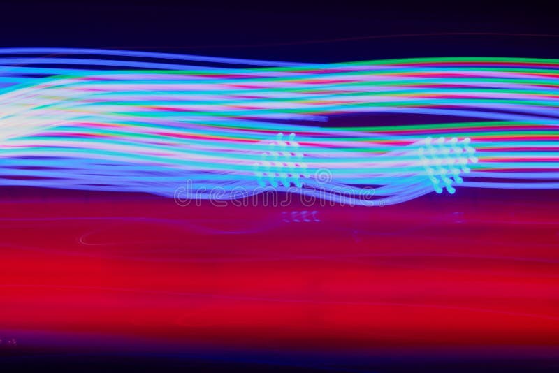 Colorful Looping Light Trails on Dark Background Stock Image - Image of ...