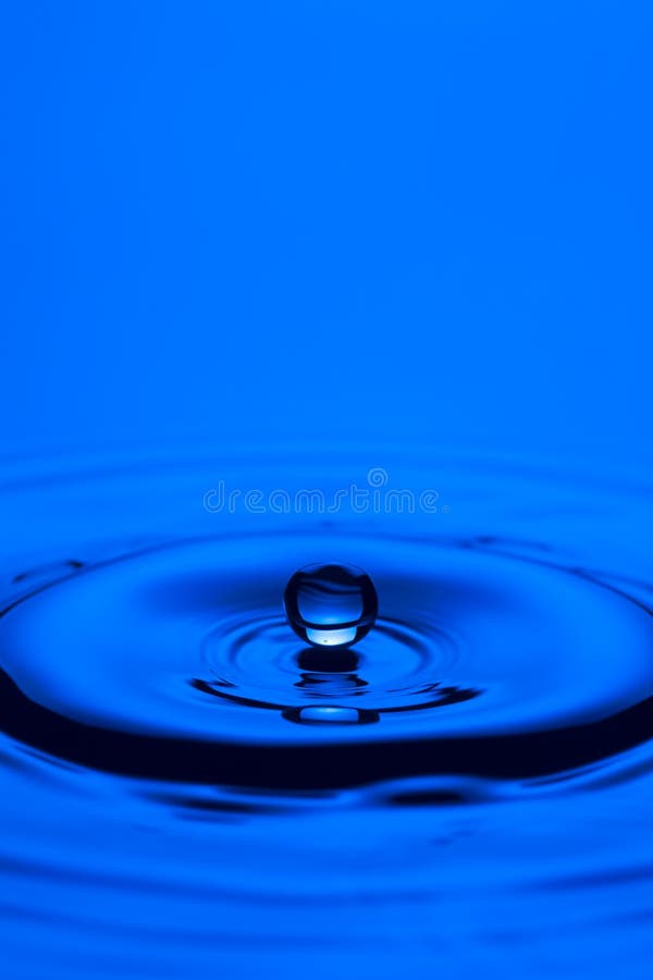 Abstract Macro Closeup Shot of One Round Water Droplet Falling with ...