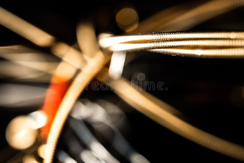 Abstract Macro Closeup of Texture Bunch of Bronze Acoustic Guitar ...