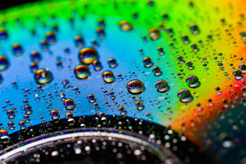 Abstract Macro Photo of Extremely Colorful Water Drops on Dvd Surface ...