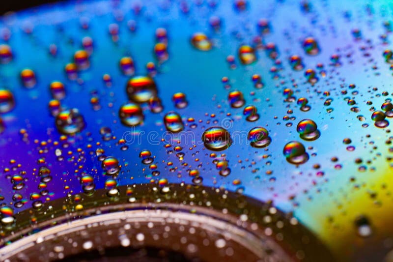 Abstract Macro Photo of Extremely Colorful Water Drops on Dvd Surface ...