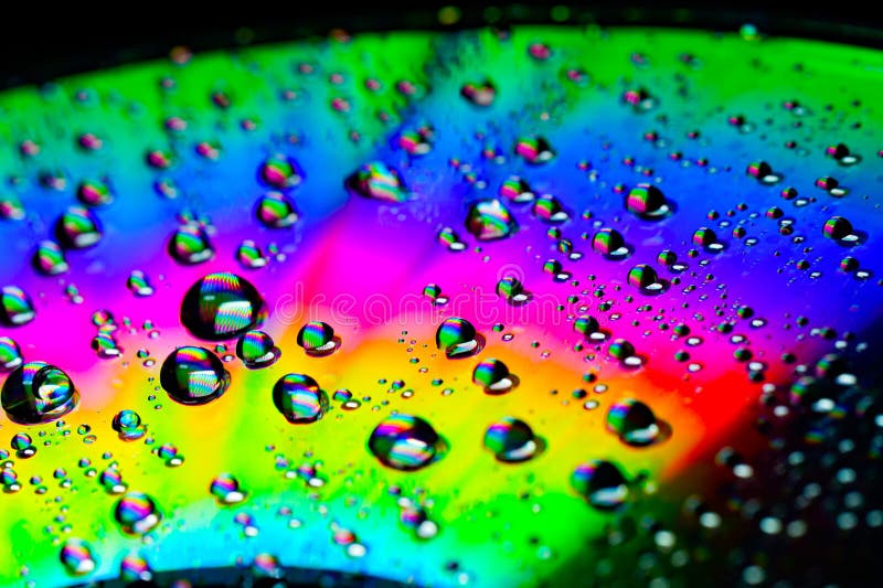 Abstract Macro Photo of Extremely Colorful Water Drops on Dvd Surface ...