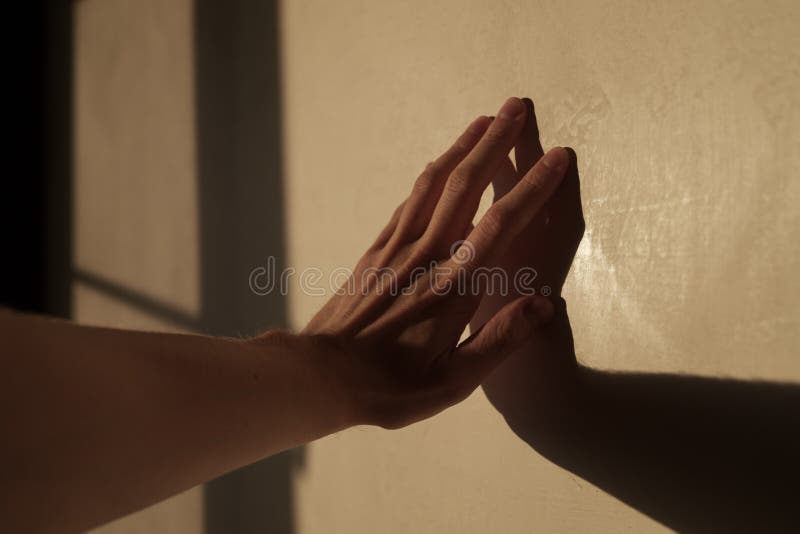 Abstract Man Hand Touch Wall with Sunset Light and Long Shadows Stock ...