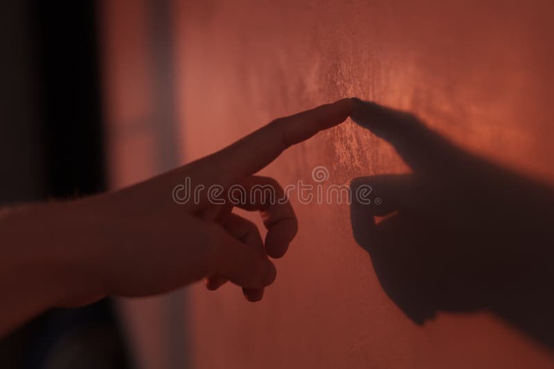 Abstract Man Hand Touch Wall with Sunset Light and Long Shadows Stock ...