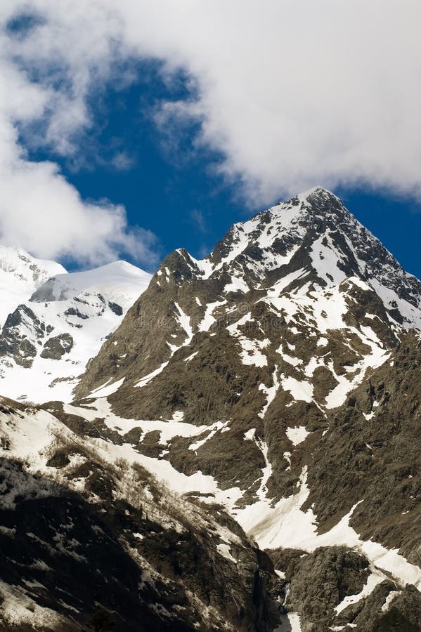 Alpine mountain stock image. Image of peak, mountain - 49614137