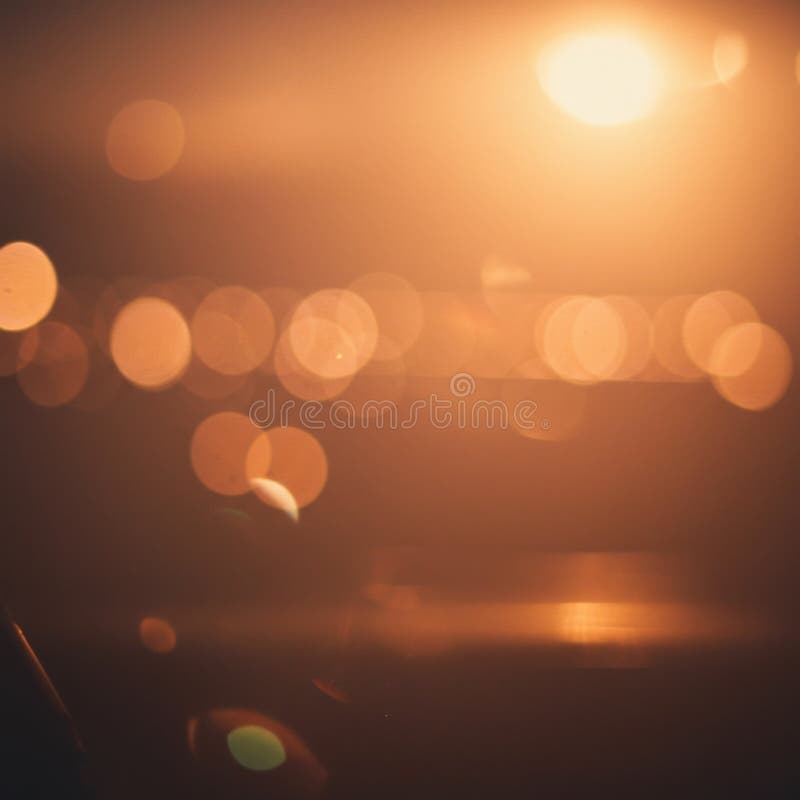 Abstract Orange Bokeh Lights at Night City Stock Illustration ...