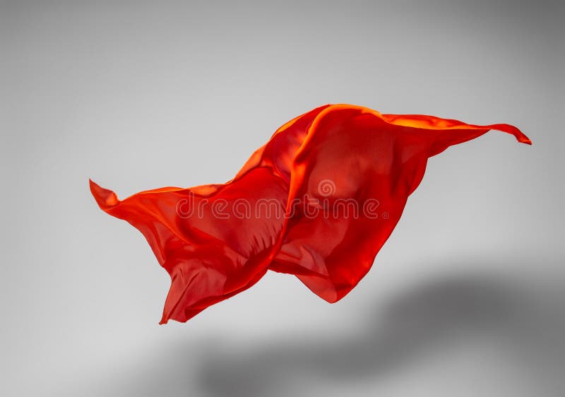 Orange flying fabric stock image. Image of golden, action - 100306163
