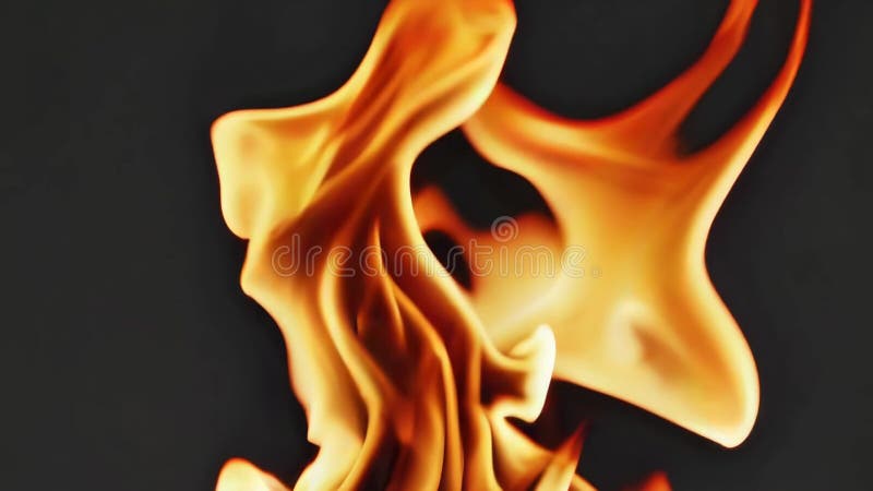 Abstract Orange and Yellow Flame Against Black Background, Dynamic ...
