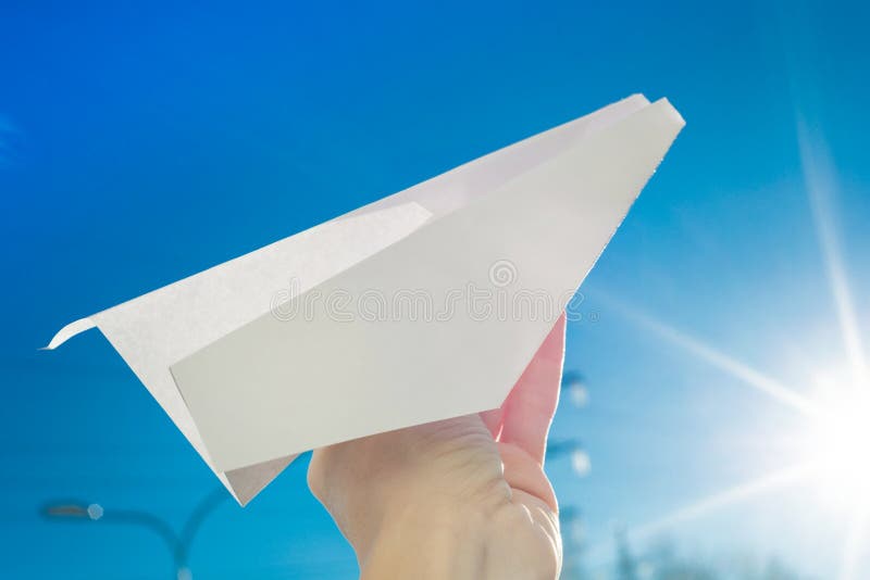 Abstract Paper Plane, in Hand, Sky, Sun Background Stock Photo - Image ...