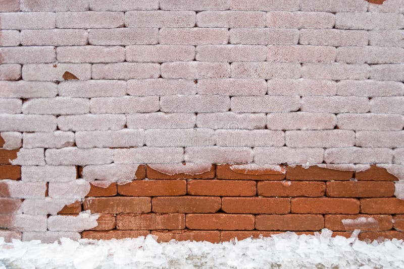 Abstract Pattern with Brown Brick Wall Partially Covered with Snow ...