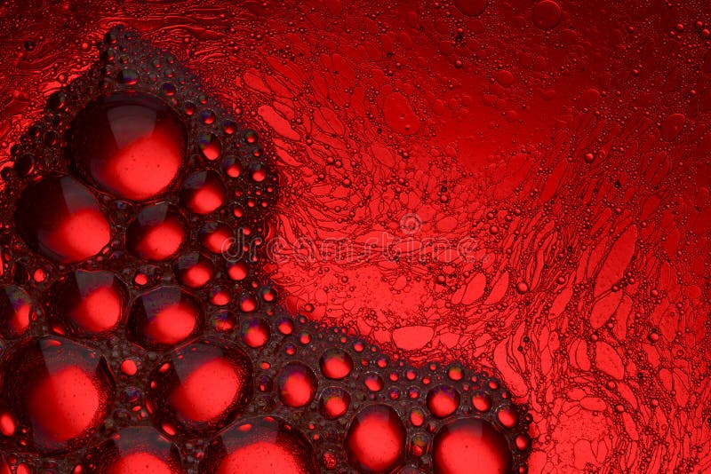 Abstract Pattern from Bubbles of Oil in Water. Red Color Background ...